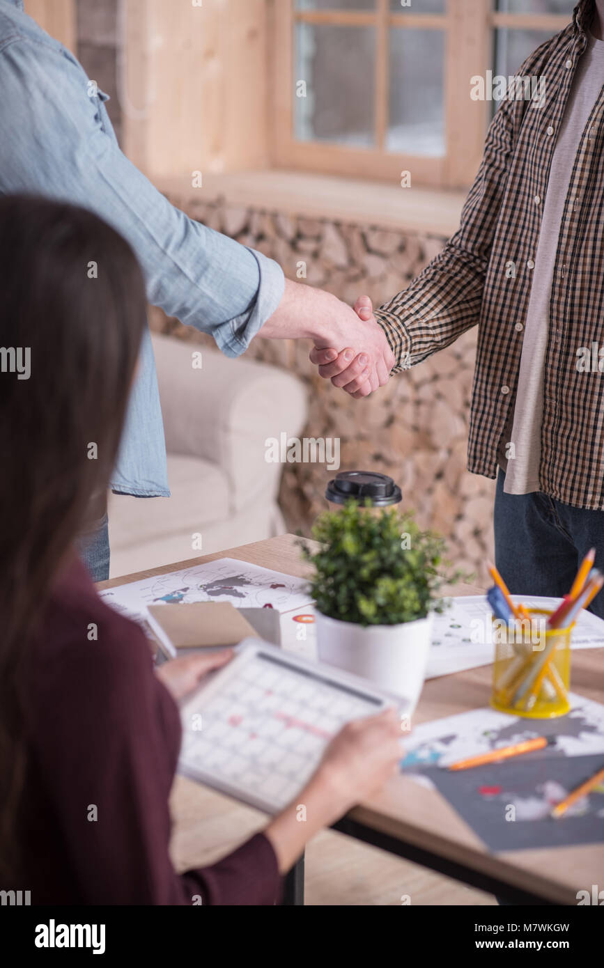 Professional handshake between colleagues hi-res stock photography and ...