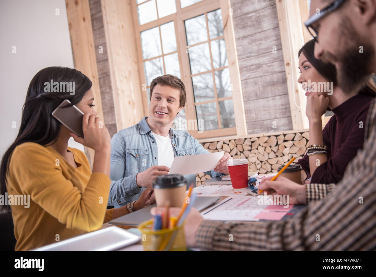 Delighted positive woman making a call Stock Photo - Alamy