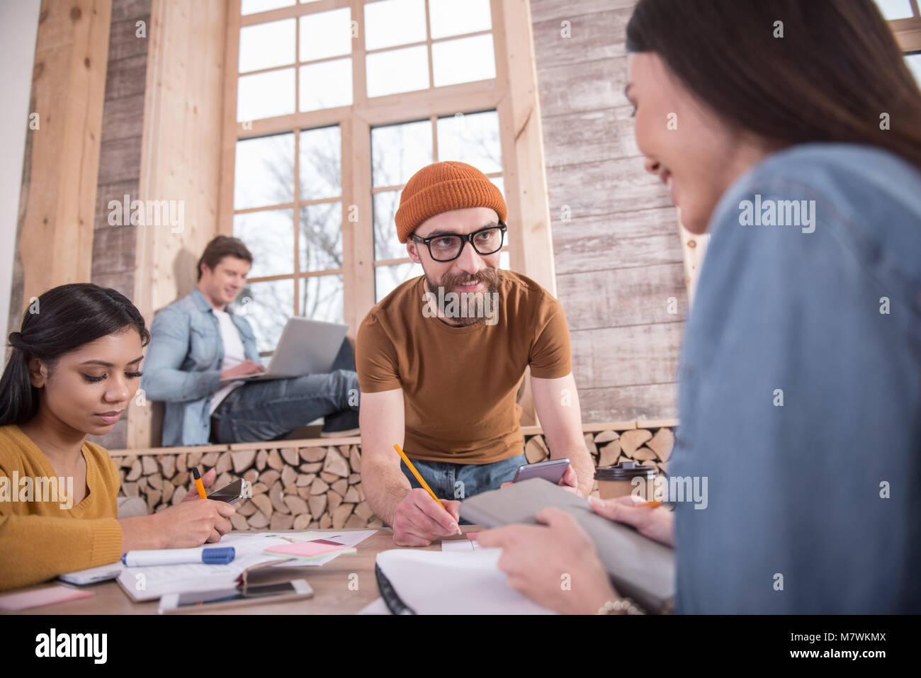 Smart young man taking notes Stock Photo - Alamy