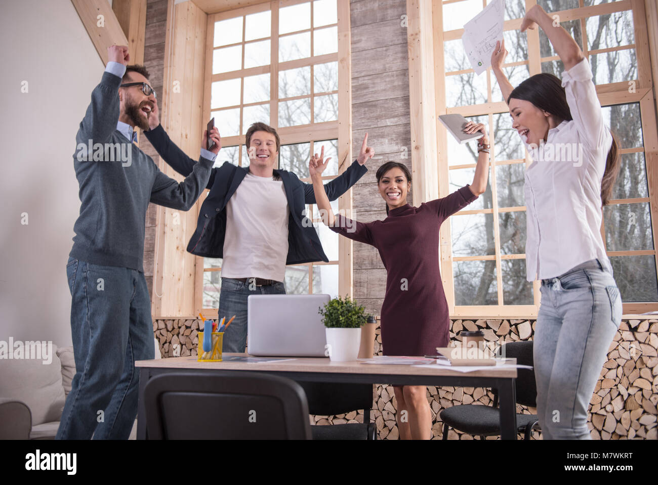 Happy young people expressing their emotions Stock Photo - Alamy