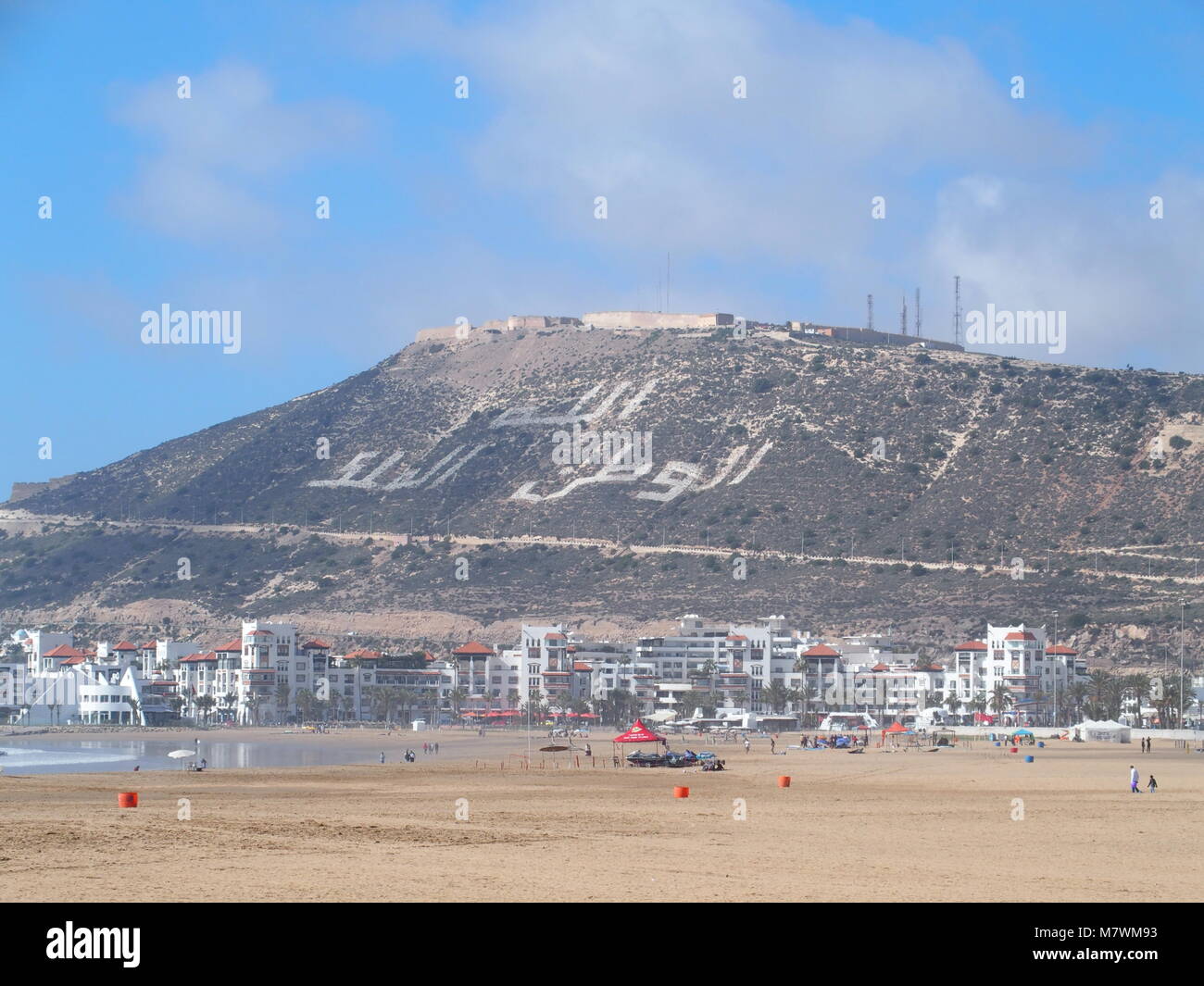Sandy beach in travel AGADIR city in MOROCCO landscapes, clear blue sky ...