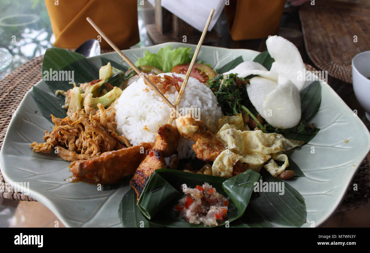 Delicious nasi campur indonesian food Stock Photo - Alamy