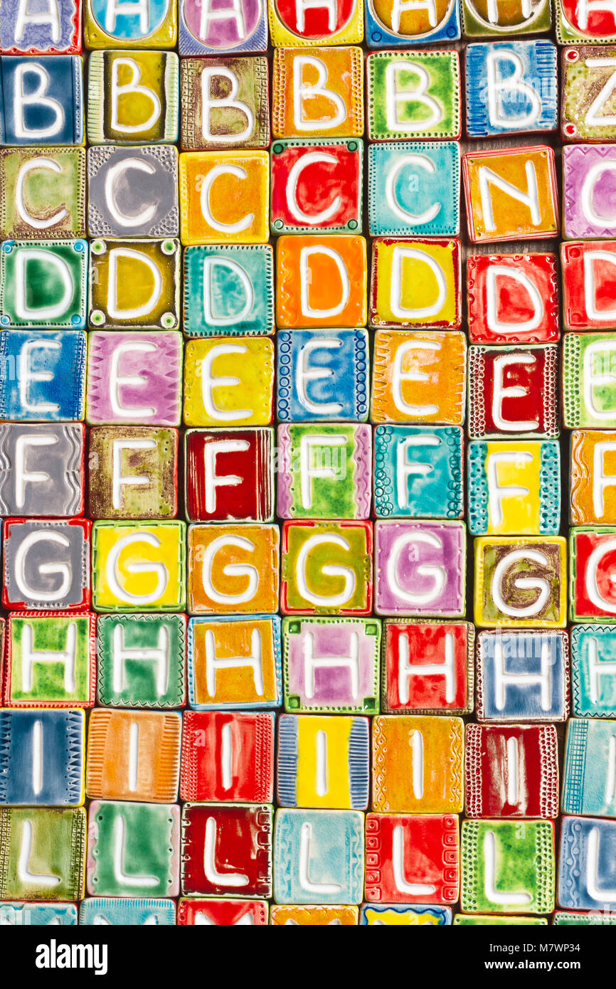 Background from colorful handmade ceramic letters Stock Photo - Alamy