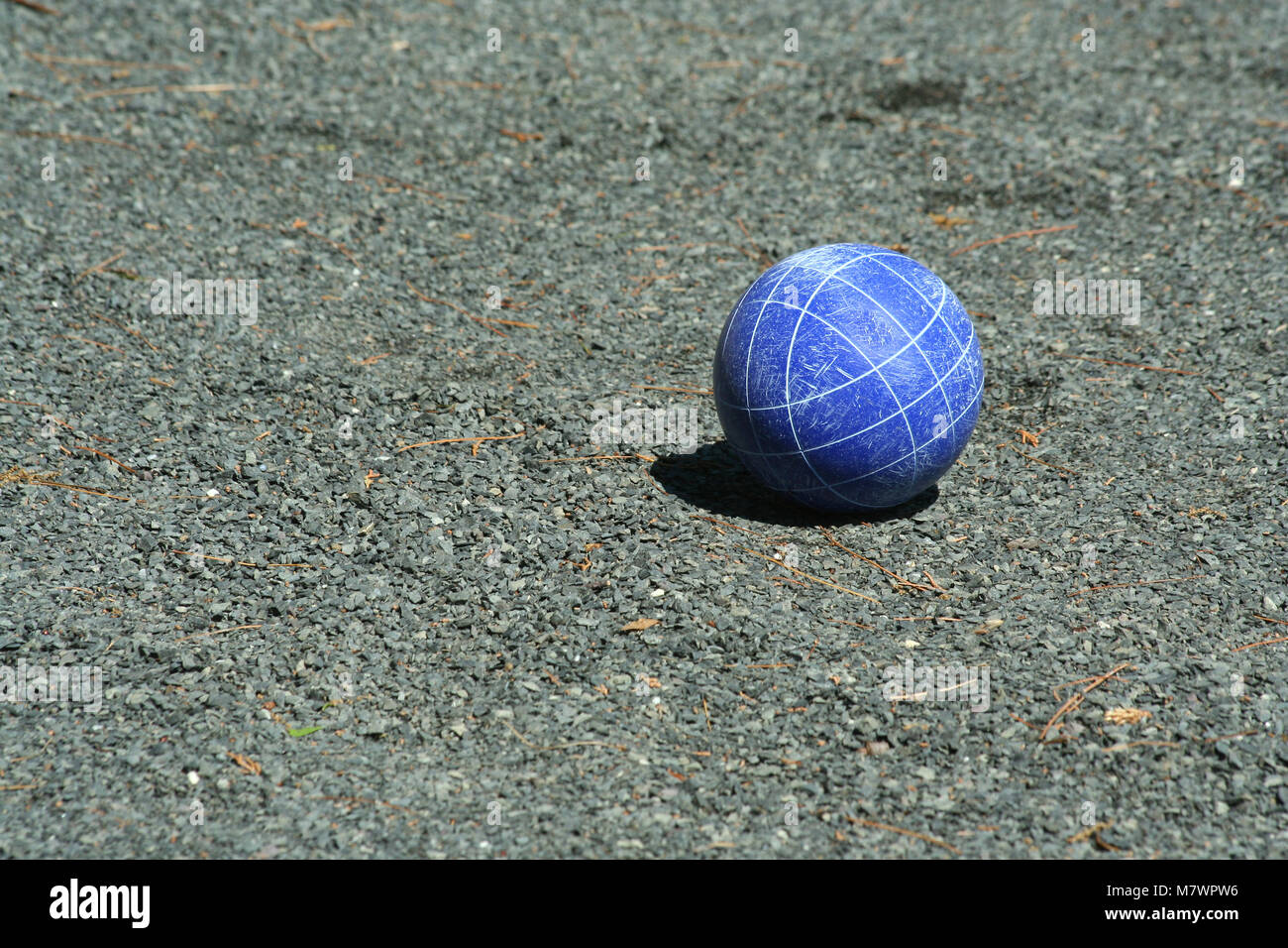 A Blue bocce ball on a court Stock Photo - Alamy
