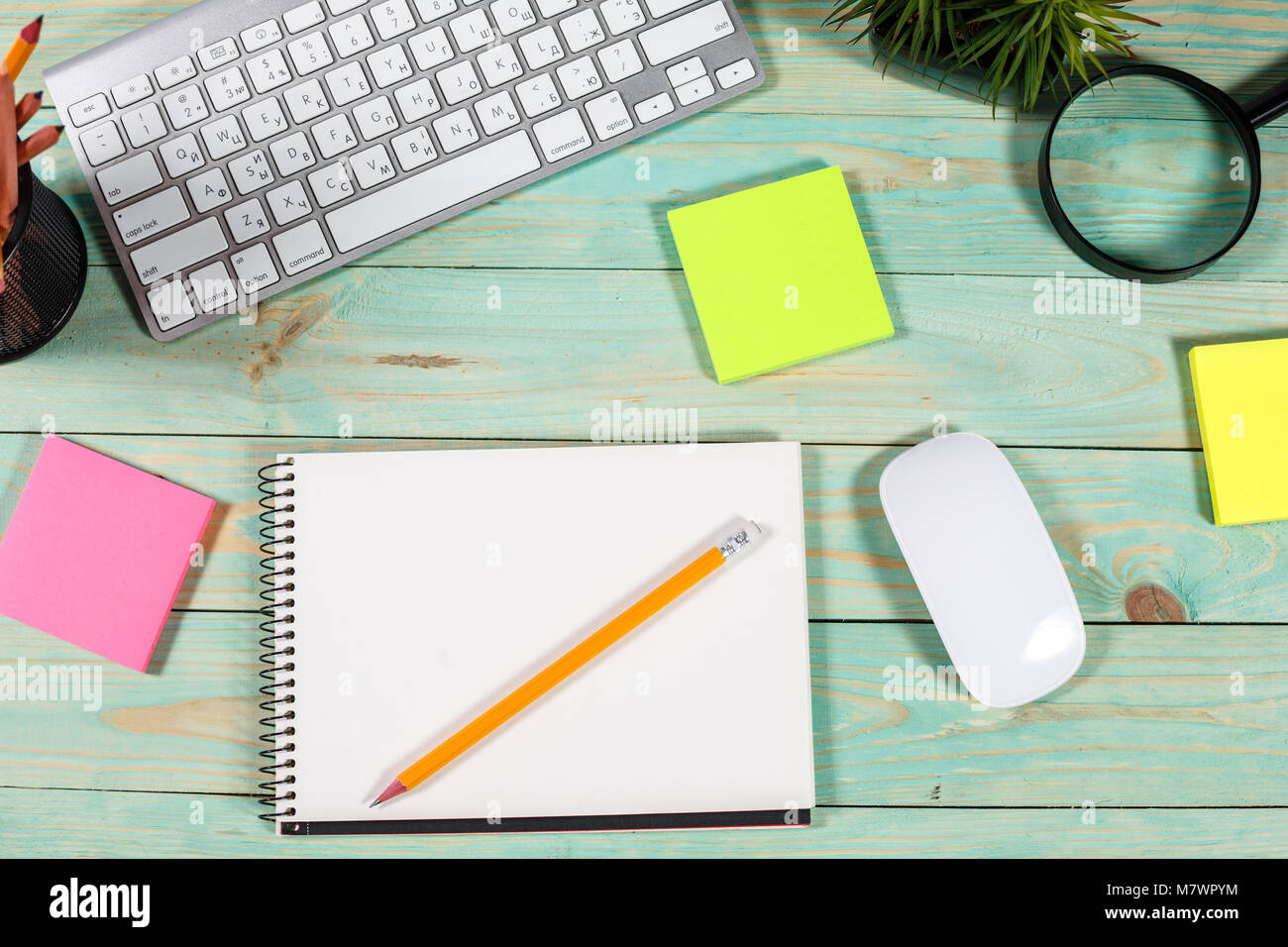 Modern green wooden office desk with laptop computer Stock Photo - Alamy