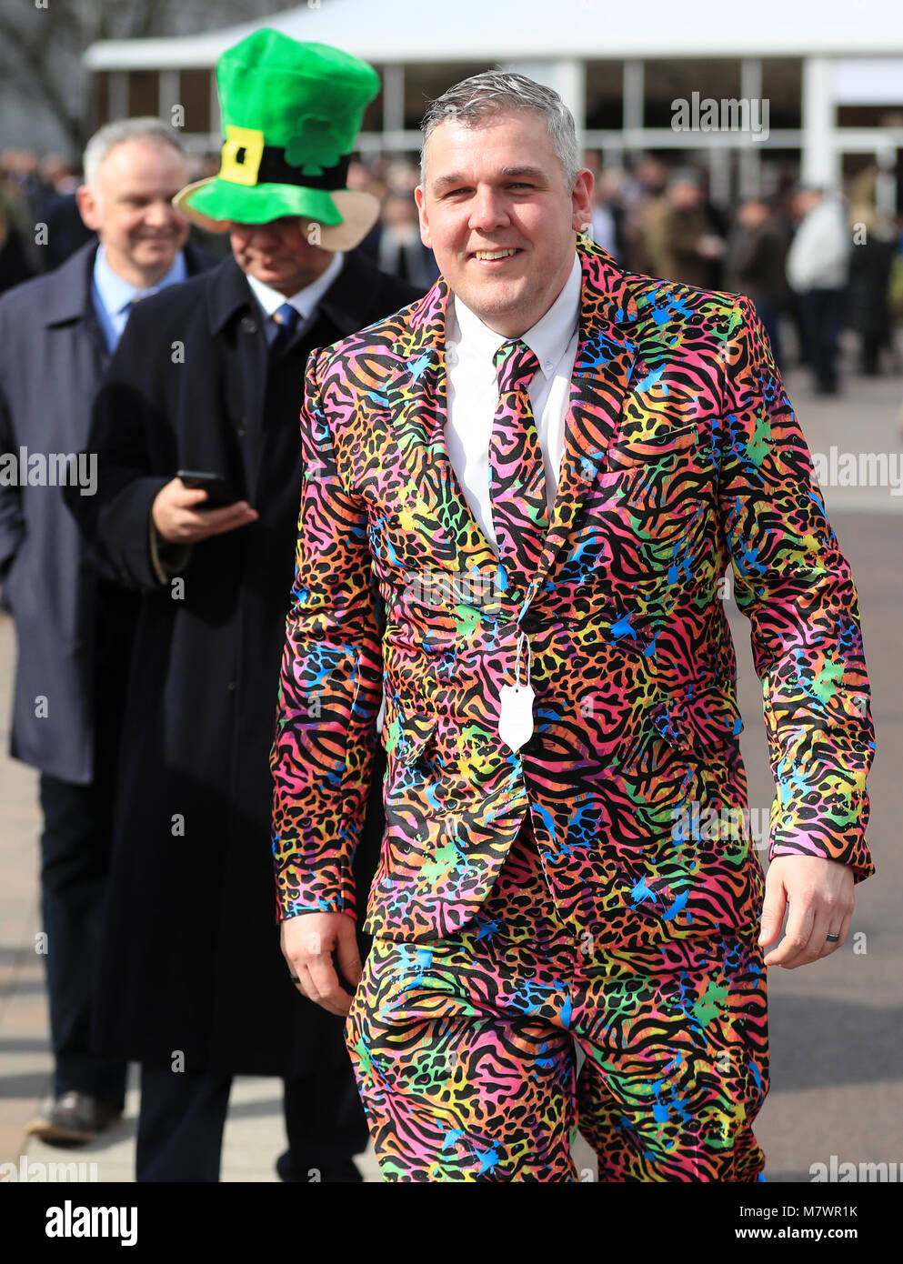 A racegoer in a multicoloured suit during Champion Day of the 2018 ...