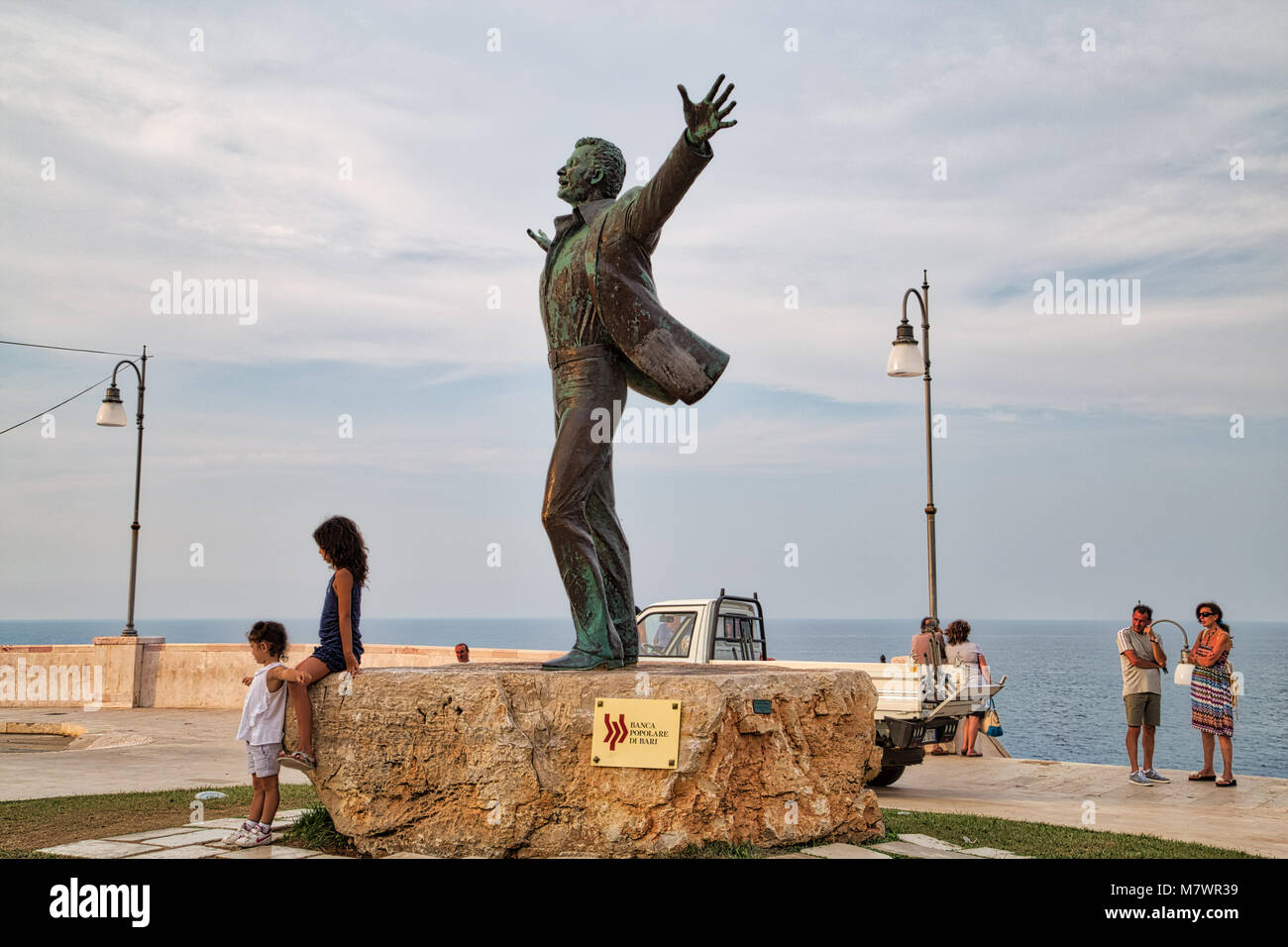 POLIGNANO (BA), ITALY - AUGUST 31, 2016: The tourists gather under the ...