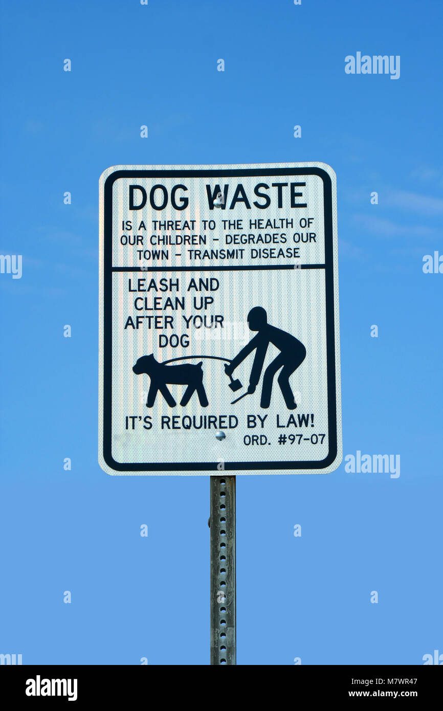 A dog waste sing against a blue sky Stock Photo - Alamy