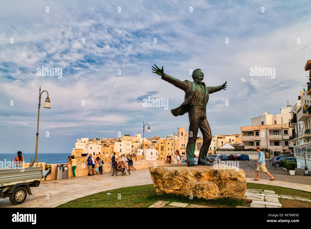 POLIGNANO (BA), ITALY - AUGUST 31, 2016: The tourists gather under the ...