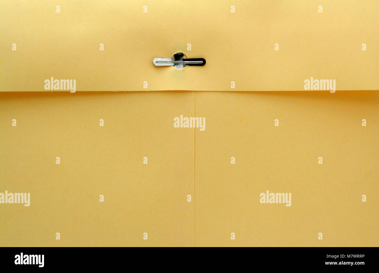 A Manila envelope macro background Stock Photo - Alamy