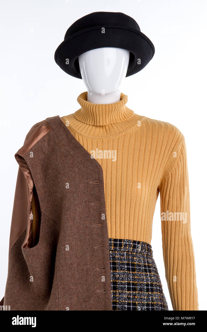 Stylish warm winter clothing on mannequin. White isolated background ...