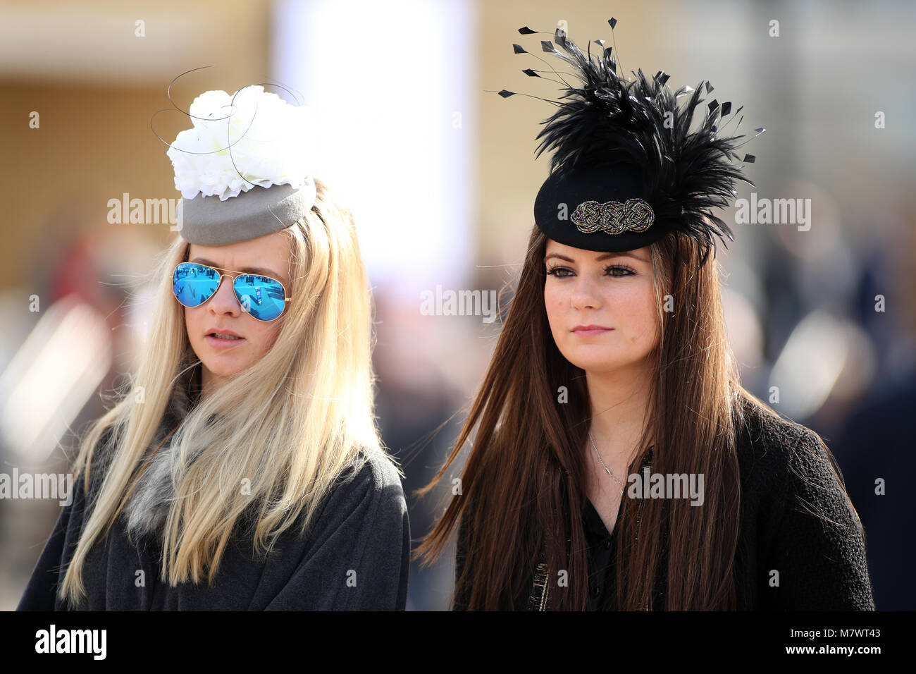 Female racegoers during Champion Day of the 2018 Cheltenham Festival at ...