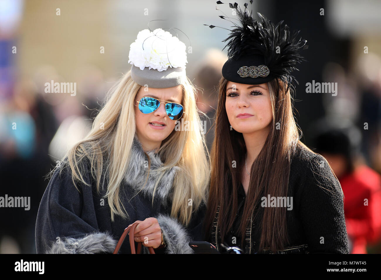 Female racegoers during Champion Day of the 2018 Cheltenham Festival at ...