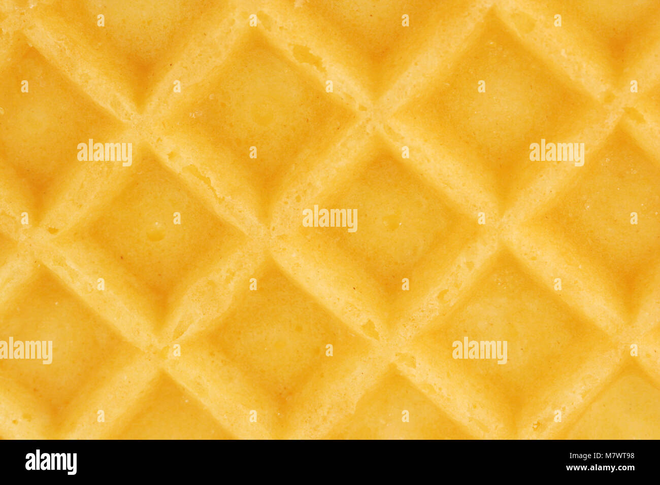 A Breakfast waffle background abstract texture macro Stock Photo - Alamy