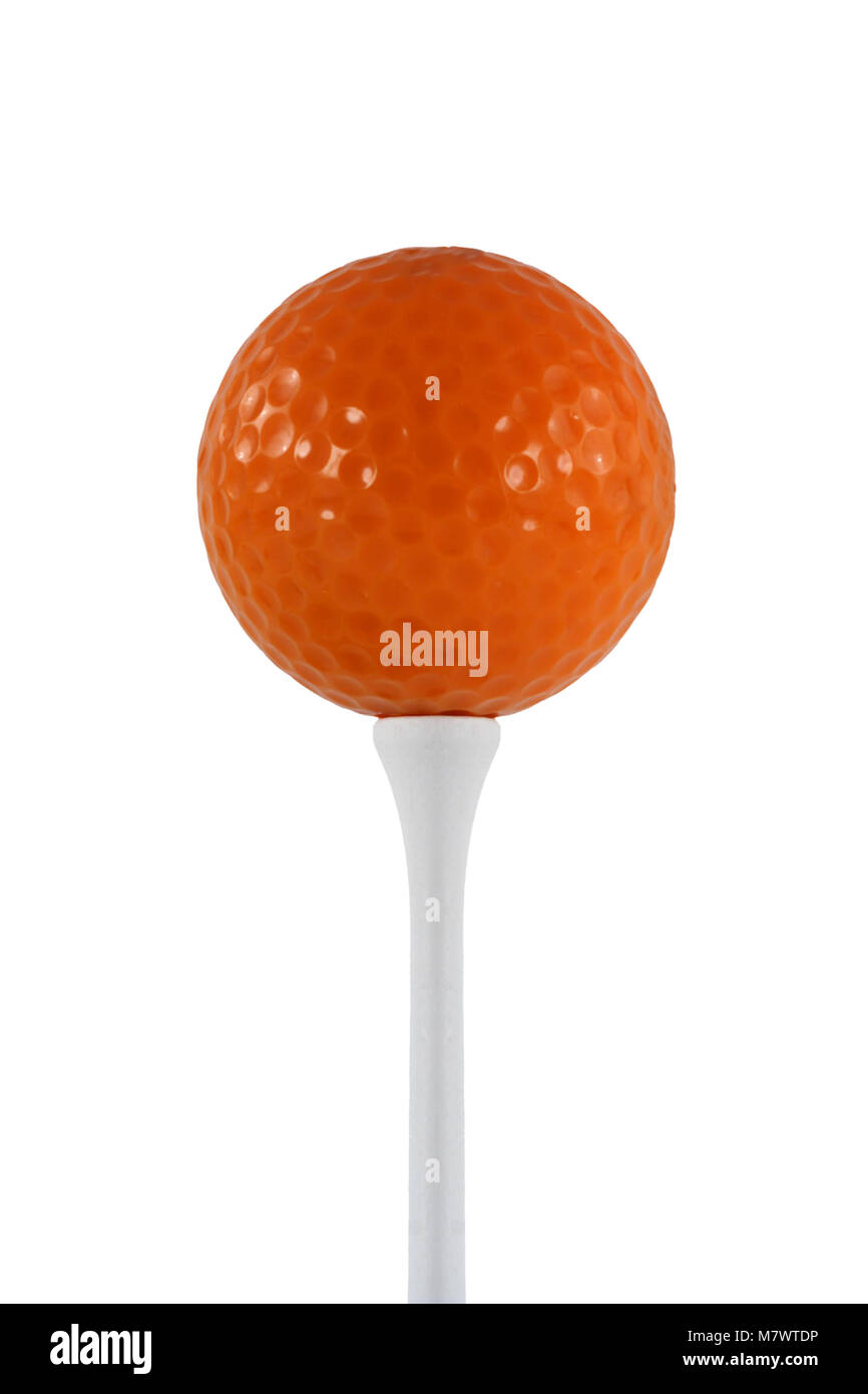 Isolated orange golf ball on a white tee Stock Photo - Alamy
