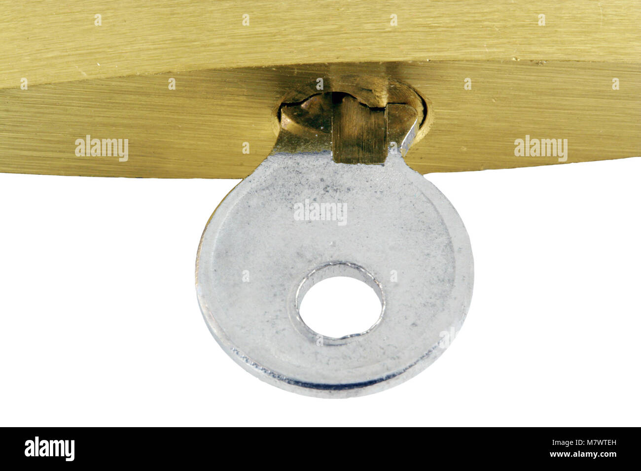 A Isolated Brass lock and key macro Stock Photo - Alamy