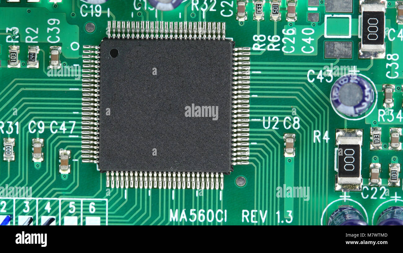 A Computer chip on curcuit board Stock Photo - Alamy