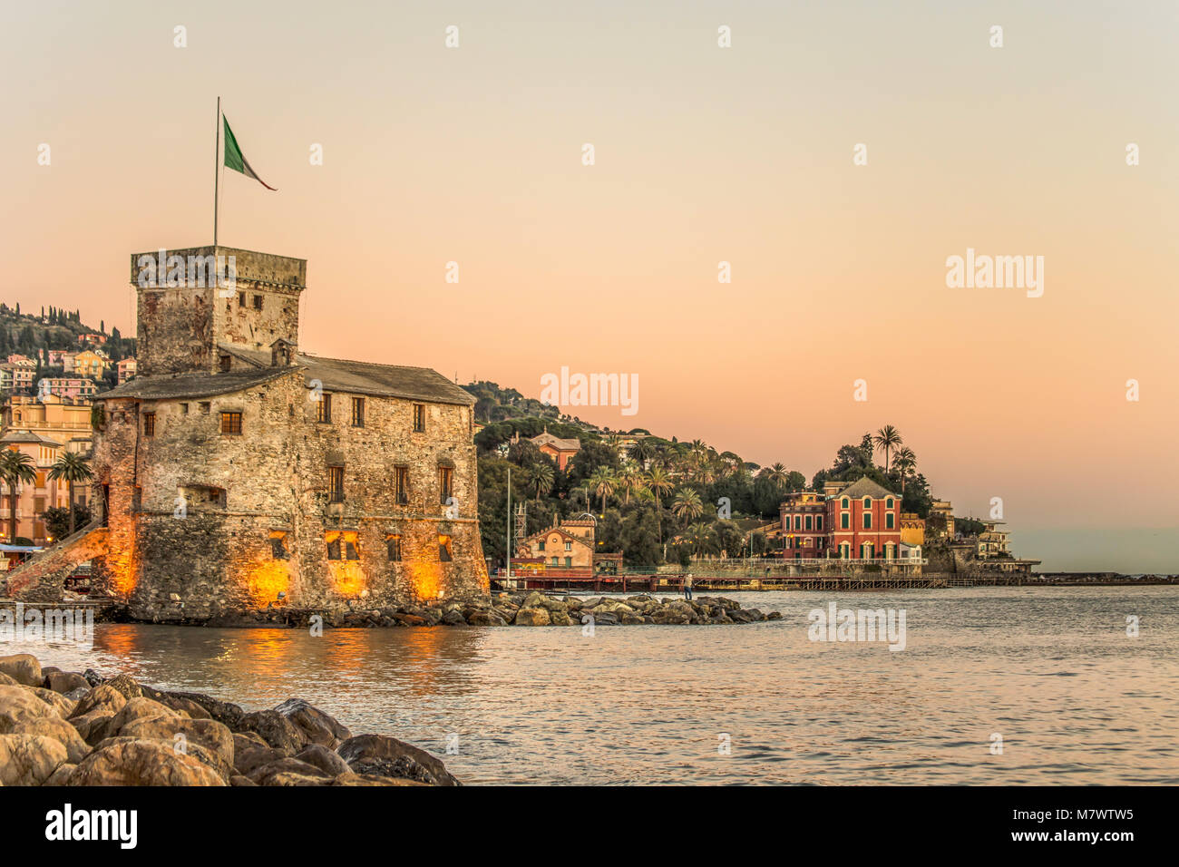 The ancient castle on the sea at sunset, Rapallo, Genoa (Genova), Italy ...