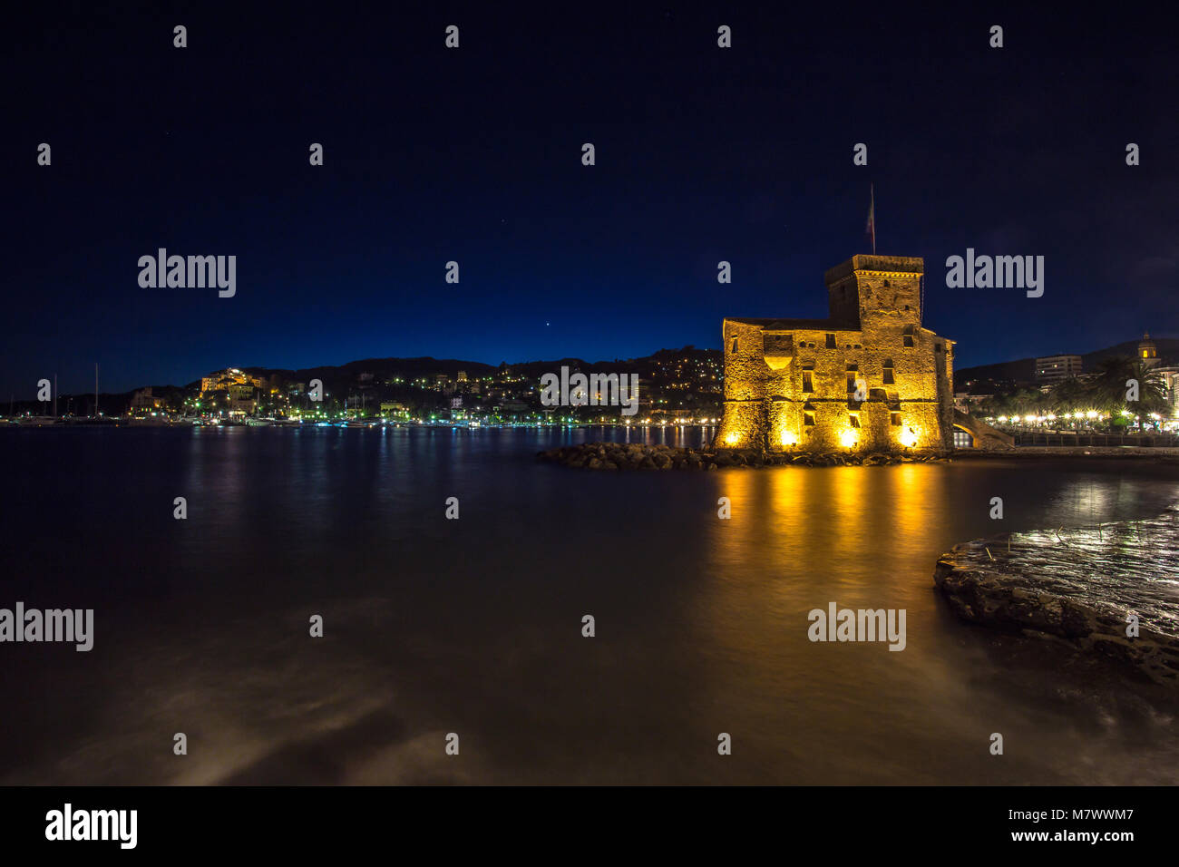 The ancient castle on the sea by night, Rapallo, Genoa (Genova), Italy ...