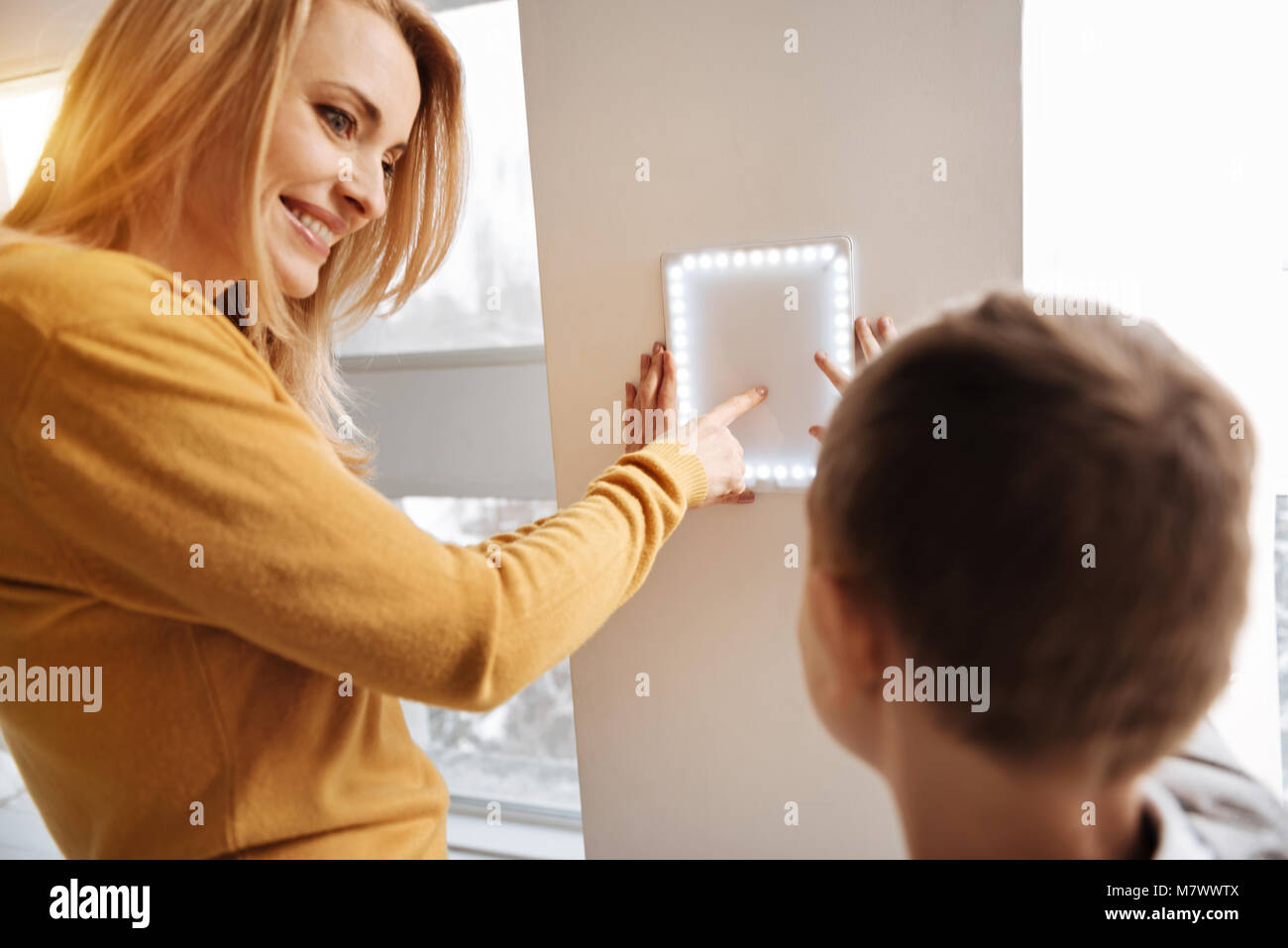 Happy boy using smart hi-res stock photography and images - Alamy