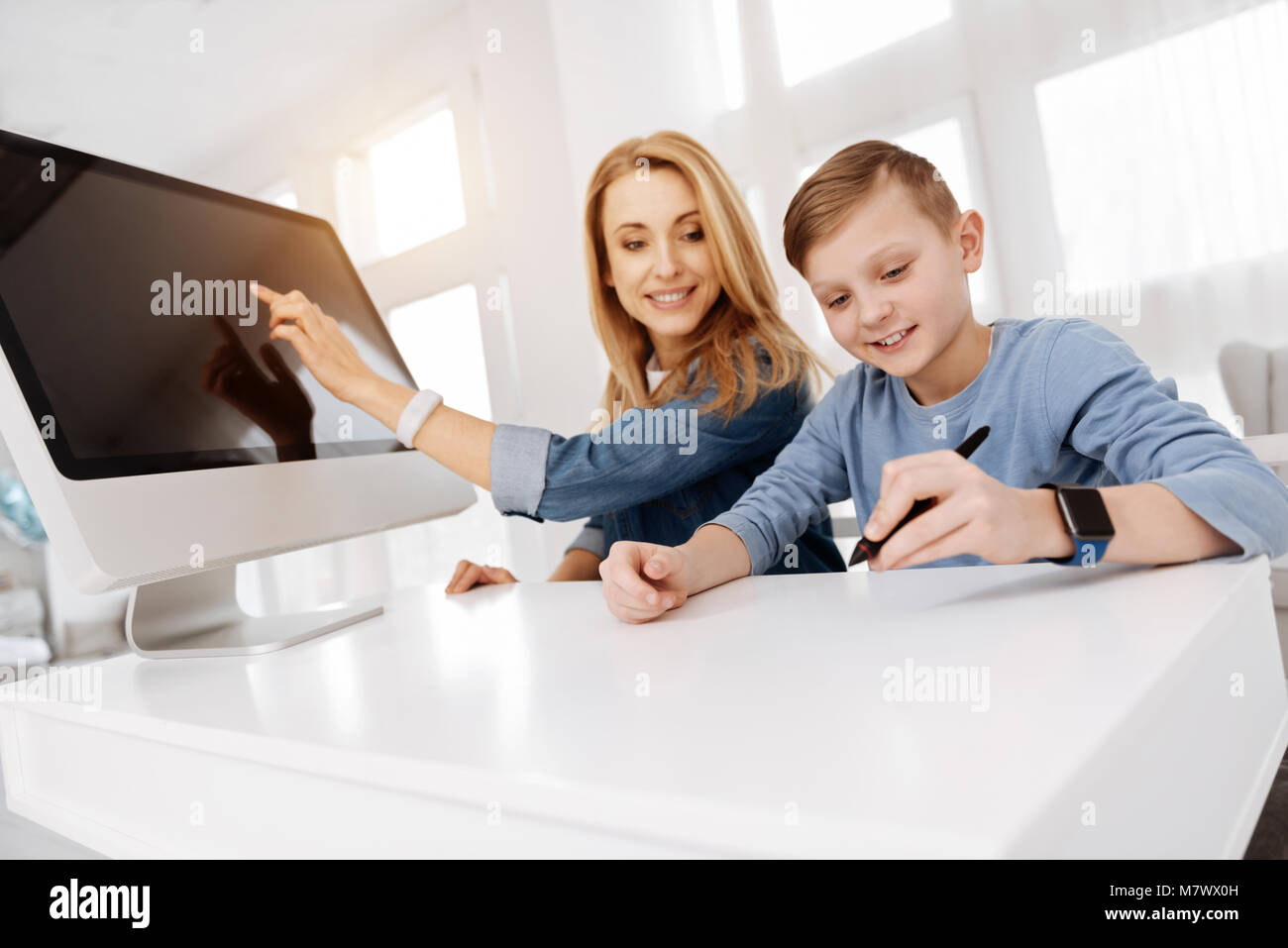 Positive creative boy drawing Stock Photo - Alamy