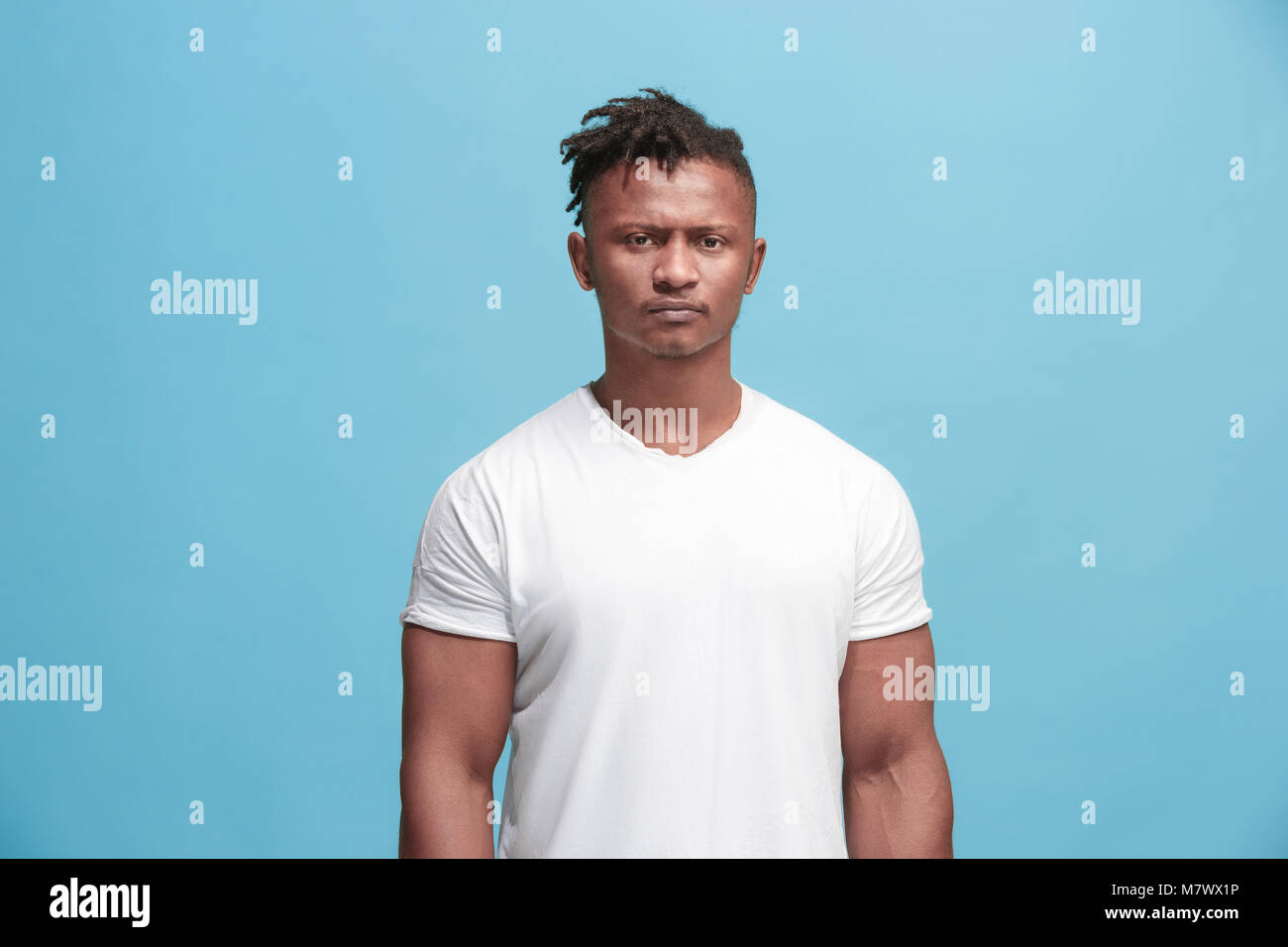 Suspiciont. Doubtful pensive man with thoughtful expression making ...