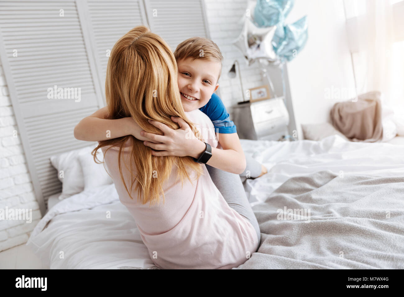 Positive cheerful boy expressing his feelings Stock Photo - Alamy