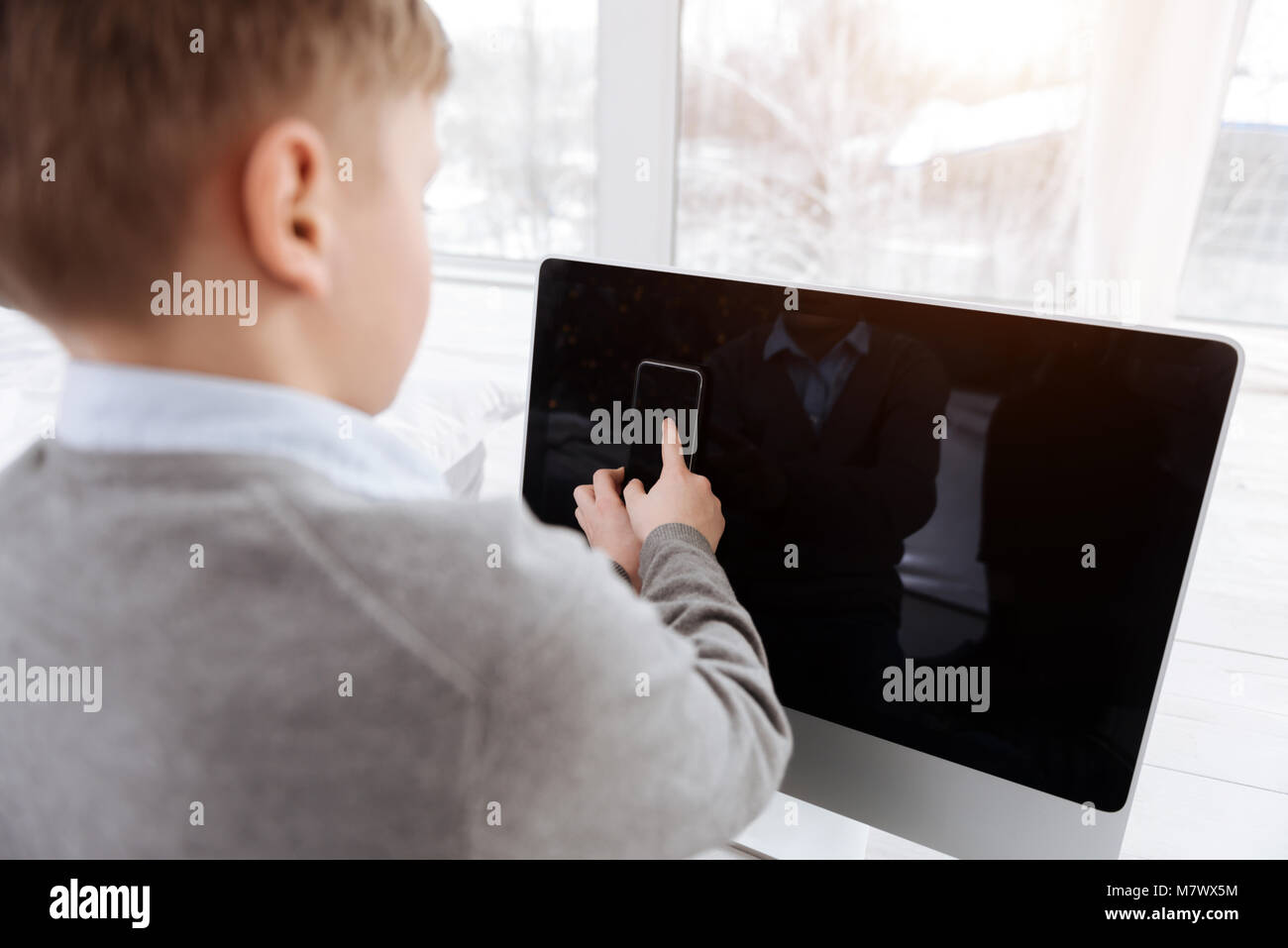 Boy smartphone home hi-res stock photography and images - Alamy