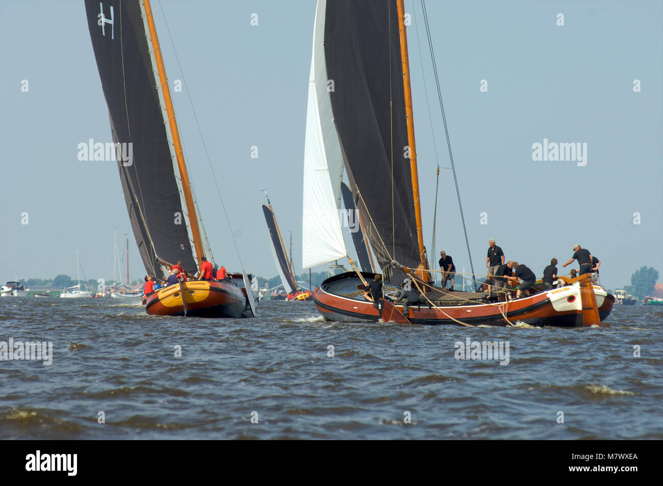 A traditional sailing race with classic Dutch wooden flat-bottemend ...