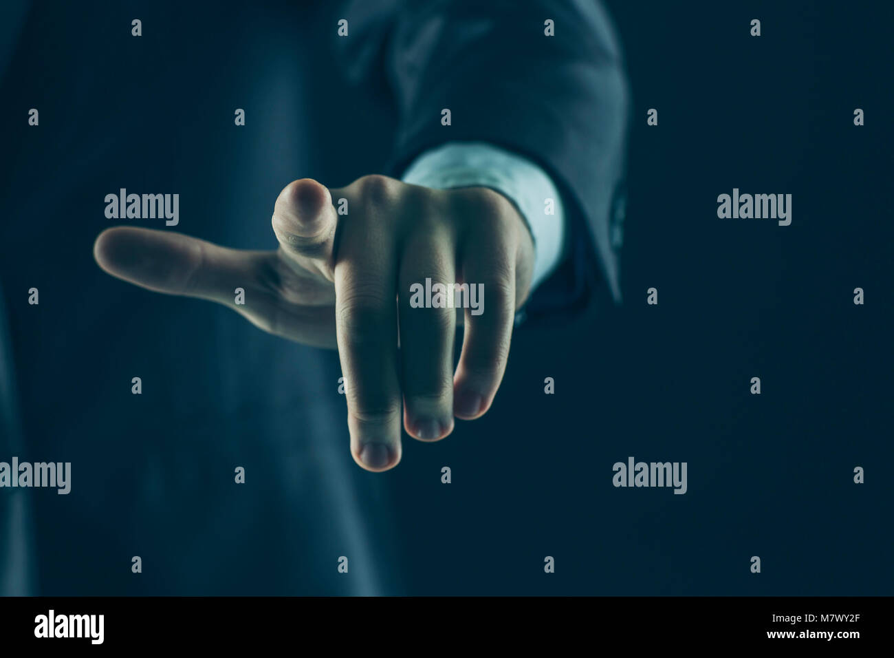 concept of success in business:businessman pointing his finger forward ...