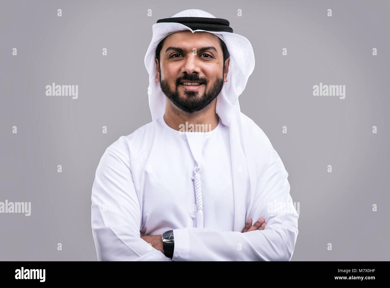 Arabic handsome man studio portraits Stock Photo - Alamy