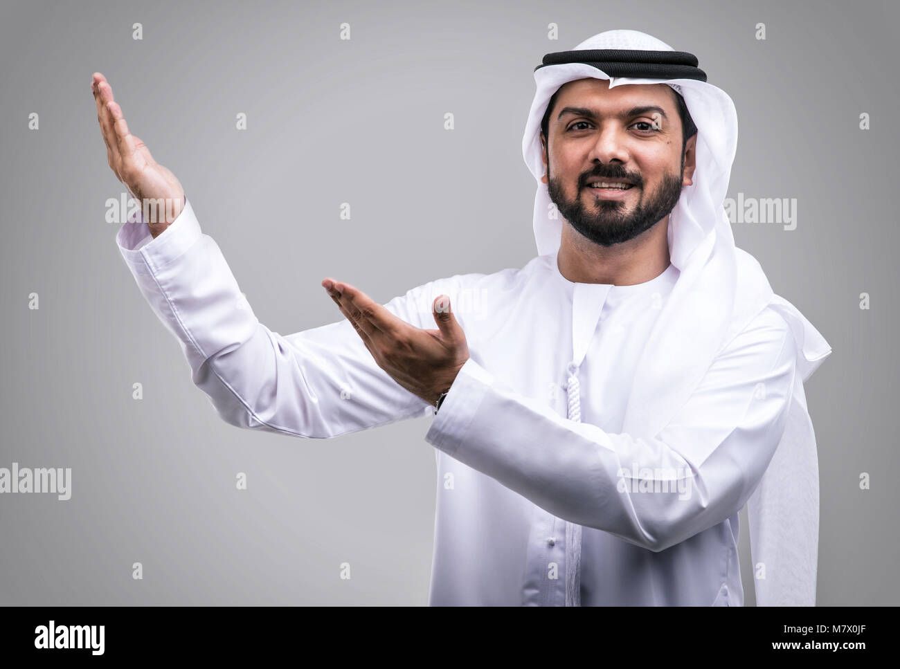Arabic handsome man studio portraits Stock Photo - Alamy