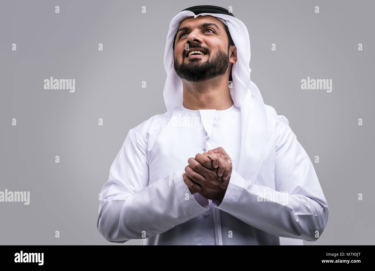 Arabic handsome man studio portraits Stock Photo - Alamy