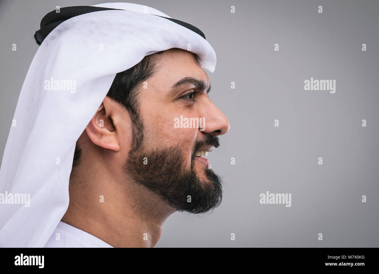 Arabic handsome man studio portraits Stock Photo - Alamy