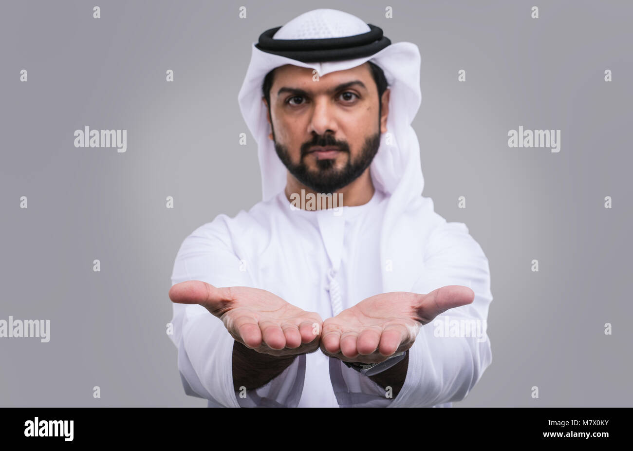 Arabic handsome man studio portraits Stock Photo - Alamy