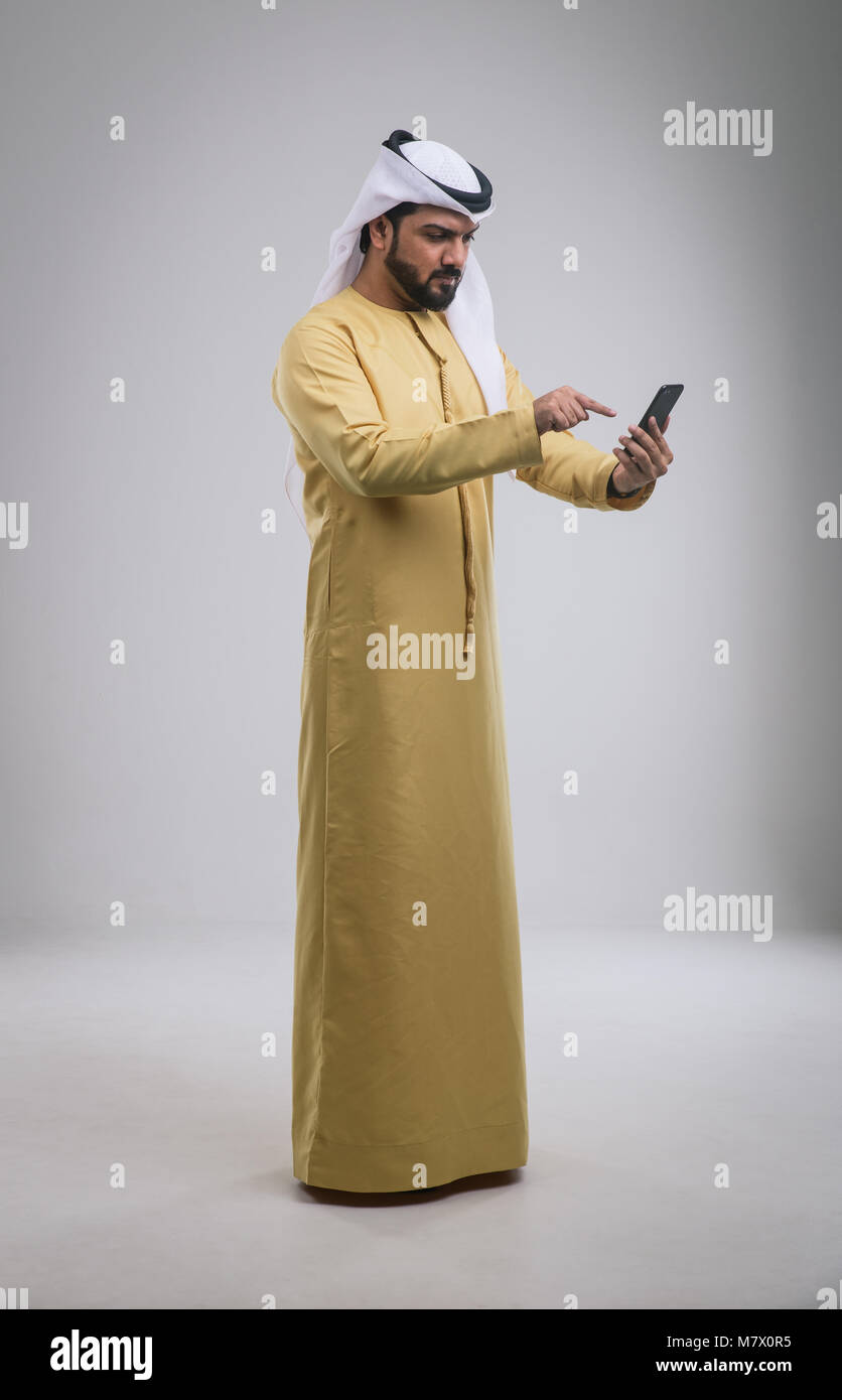 Arabic handsome man studio portraits Stock Photo - Alamy