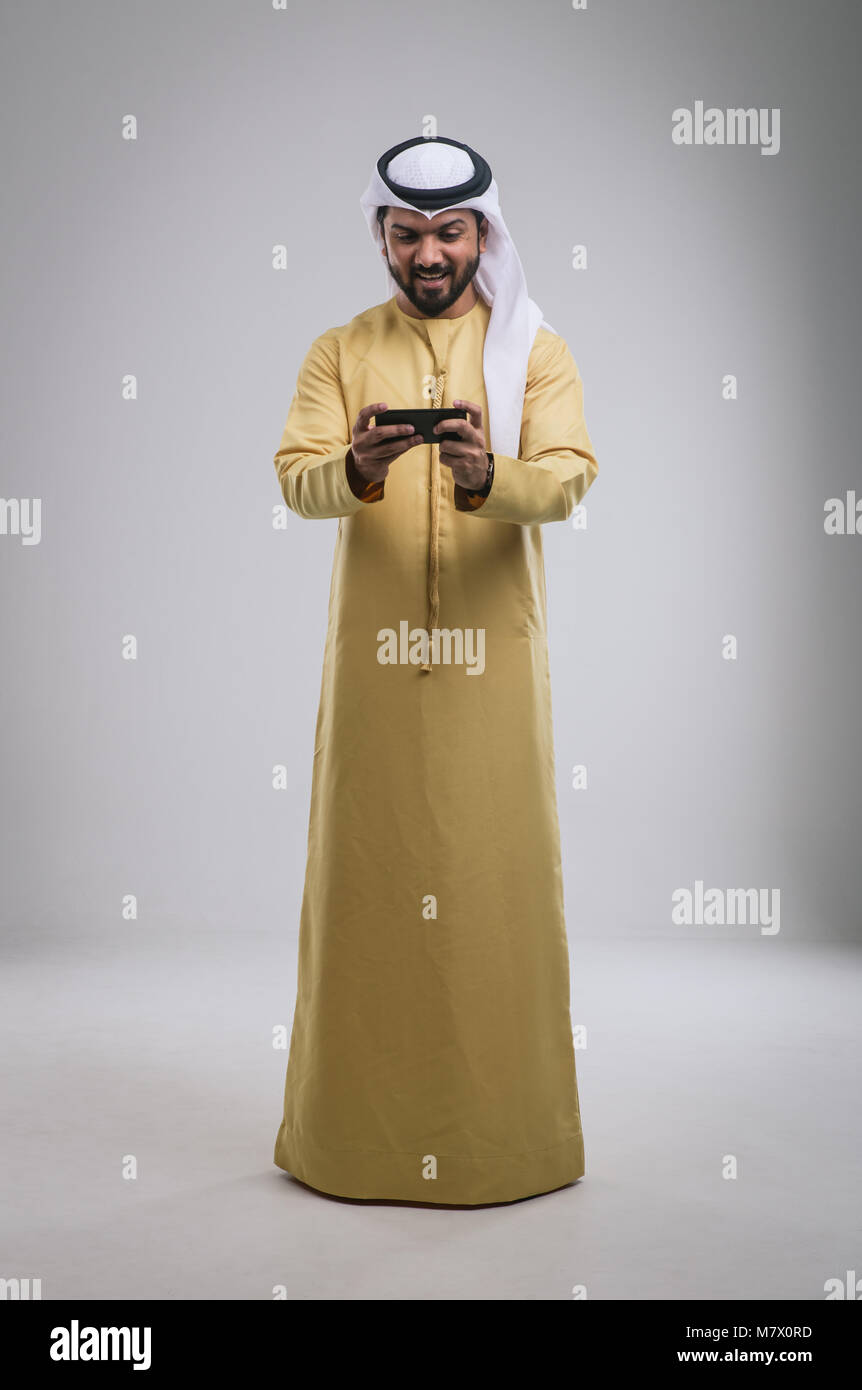 Arabic handsome man studio portraits Stock Photo - Alamy