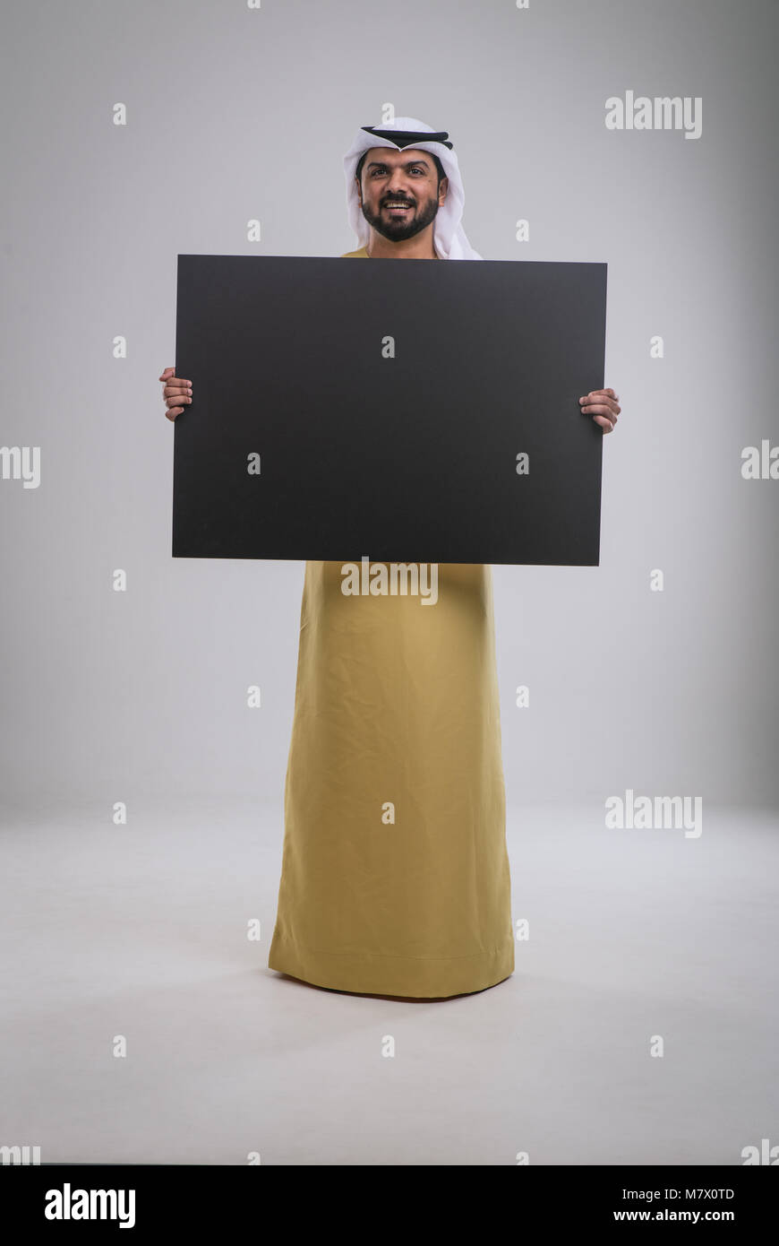 Arabic handsome man studio portraits Stock Photo - Alamy