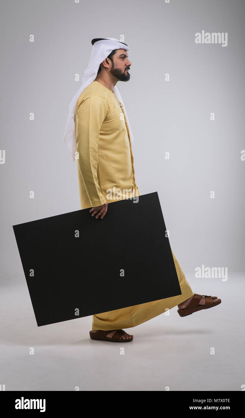Arabic handsome man studio portraits Stock Photo - Alamy