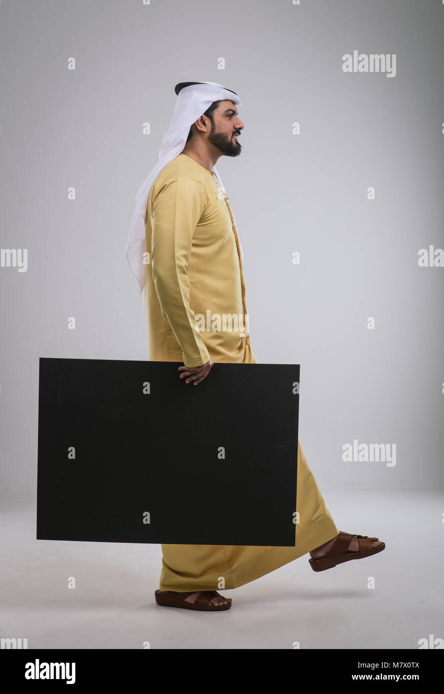 Arabic handsome man studio portraits Stock Photo - Alamy