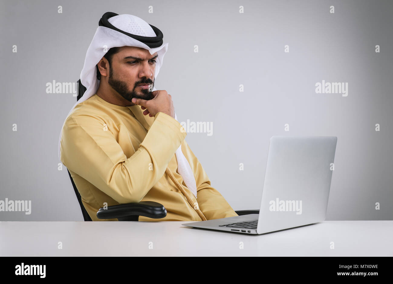 Arabic handsome man studio portraits Stock Photo - Alamy