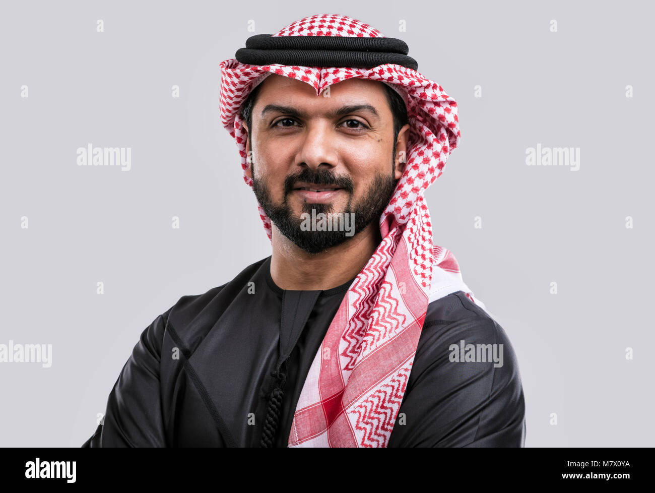 Arabic handsome man studio portraits Stock Photo - Alamy