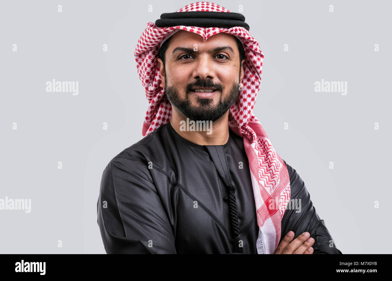Arabic handsome man studio portraits Stock Photo - Alamy