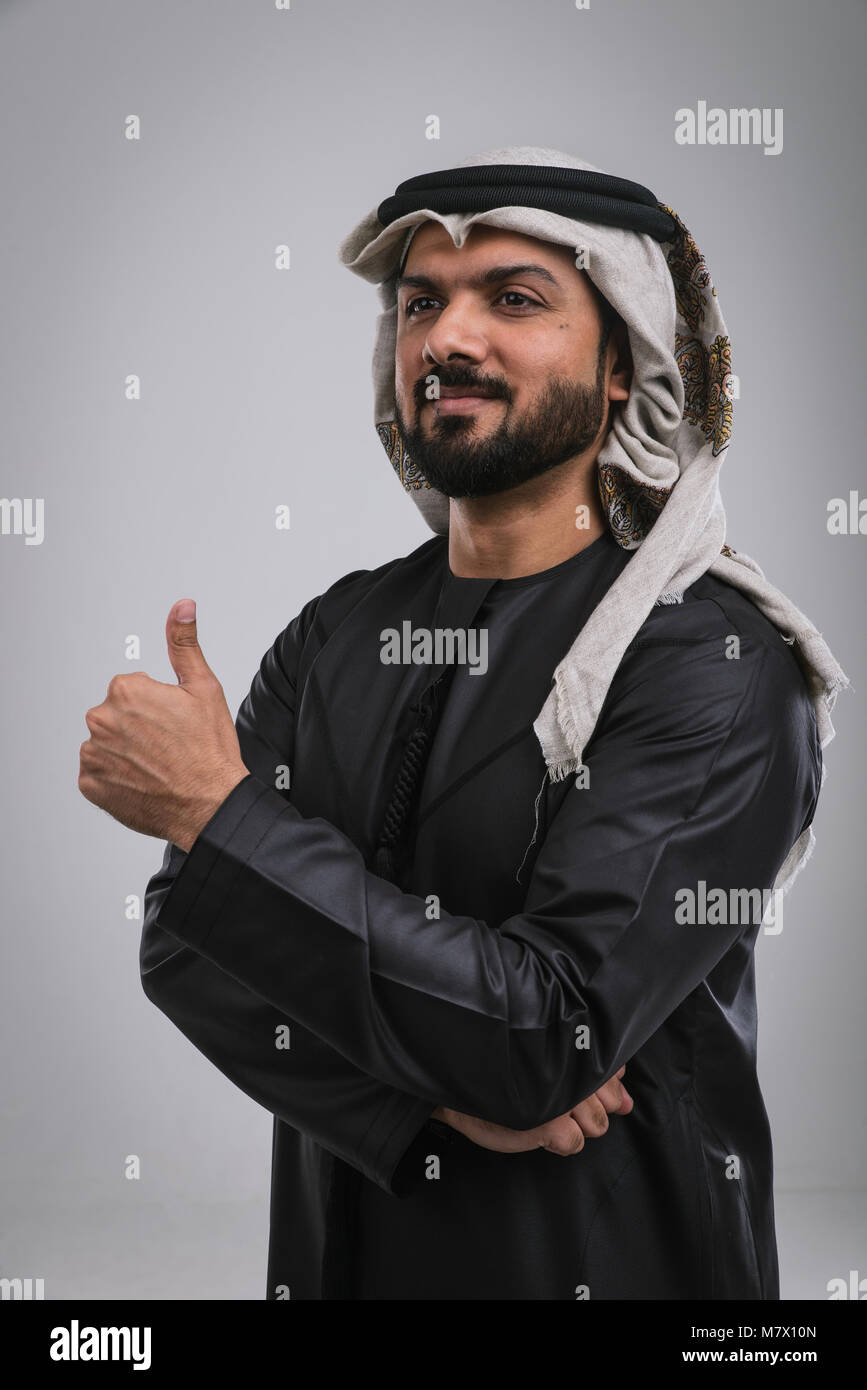 Arabic handsome man studio portraits Stock Photo - Alamy