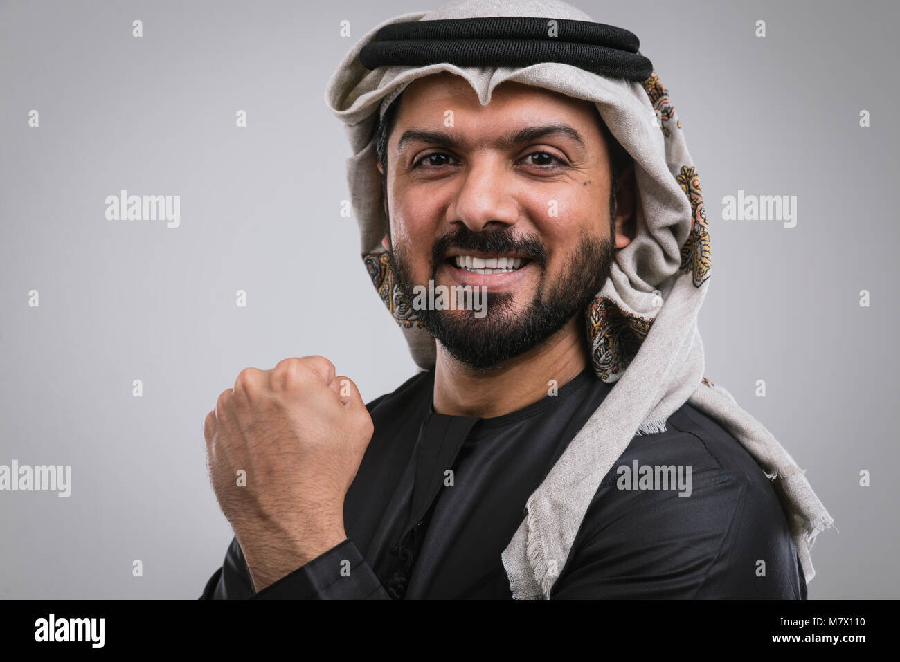 Arabic handsome man studio portraits Stock Photo - Alamy
