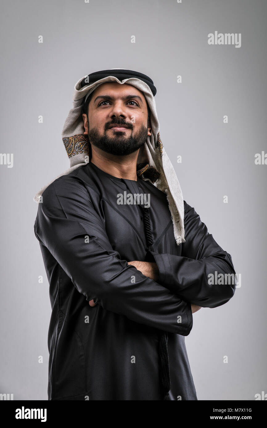 Arabic handsome man studio portraits Stock Photo - Alamy