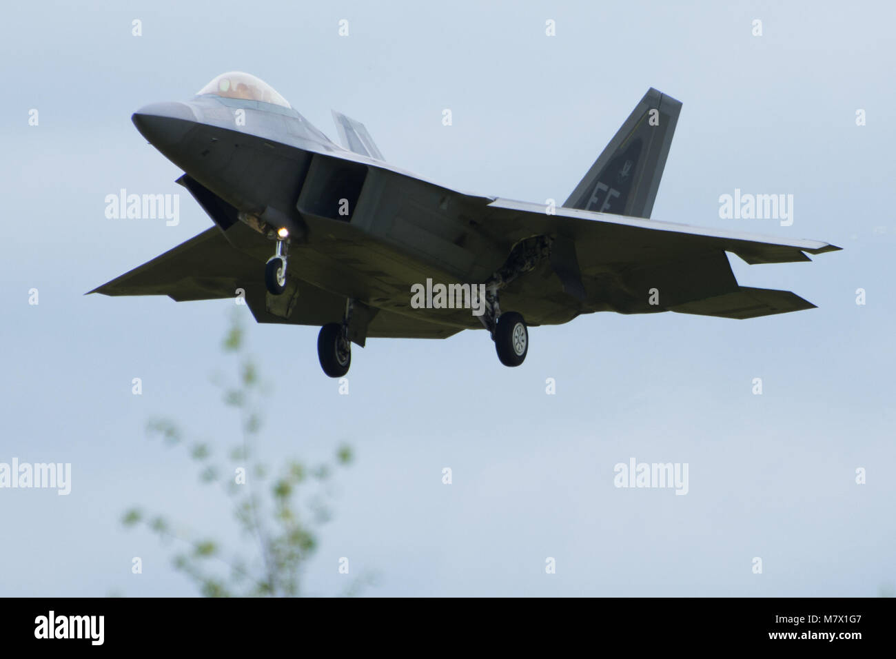 f35 lockheed martin US fighter jet taking off and landing at airshow in ...