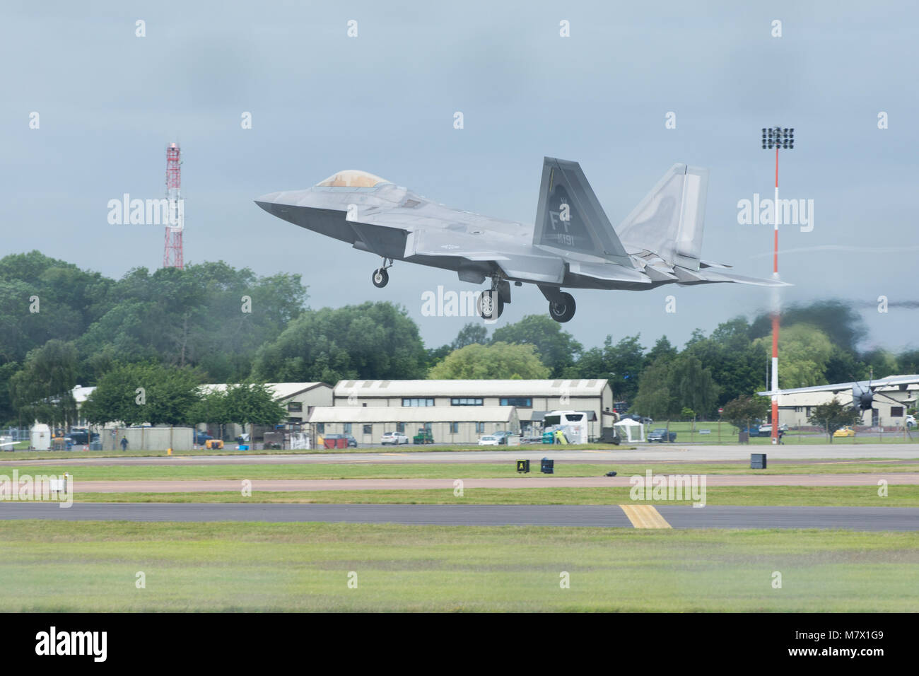 f35 lockheed martin US fighter jet taking off and landing at airshow in ...