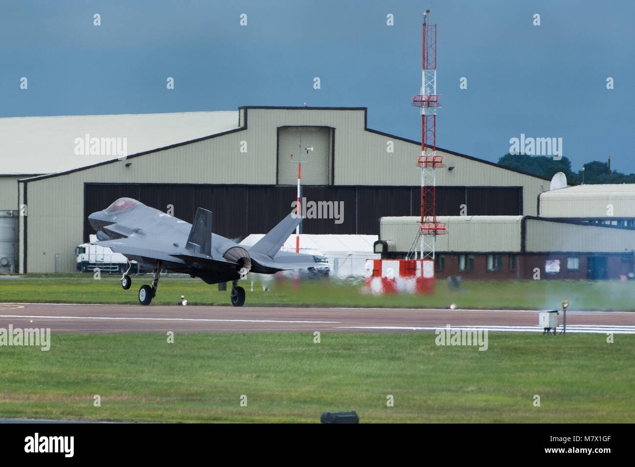f35 lockheed martin US fighter jet taking off and landing at airshow in ...