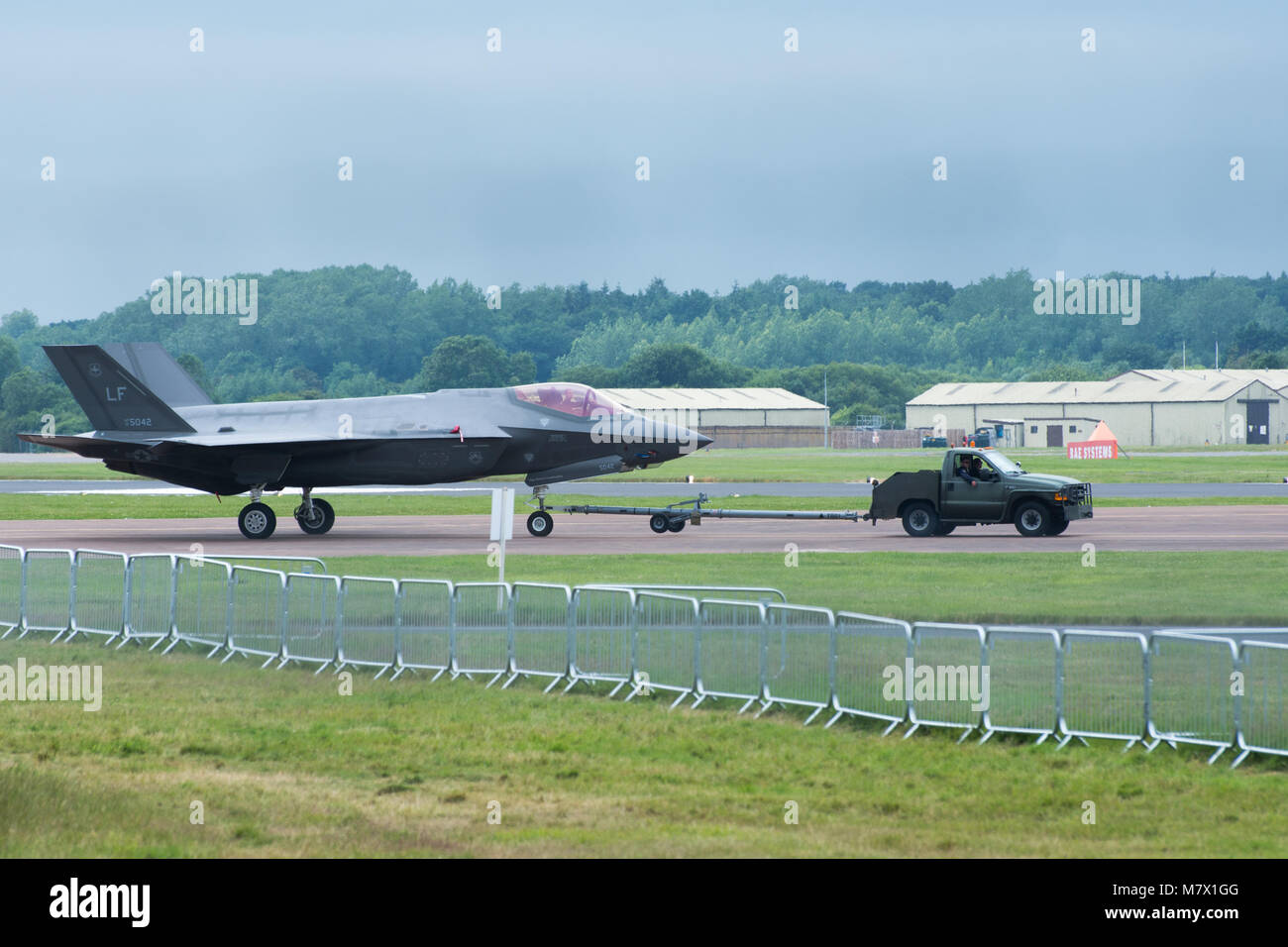 f35 lockheed martin jet being towed to the runway Stock Photo - Alamy